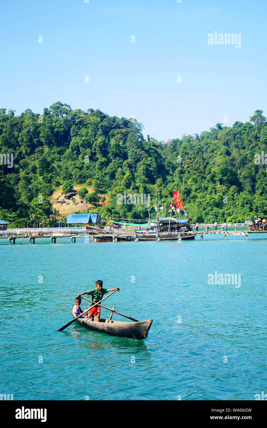 Curious Moken children approach our vessel as we anchor off Moken ...