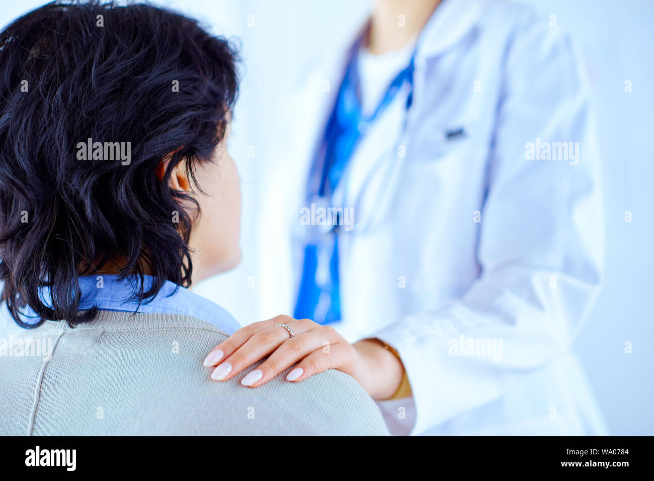 The doctor reassures the patient. Doctor and patient conversation Stock ...
