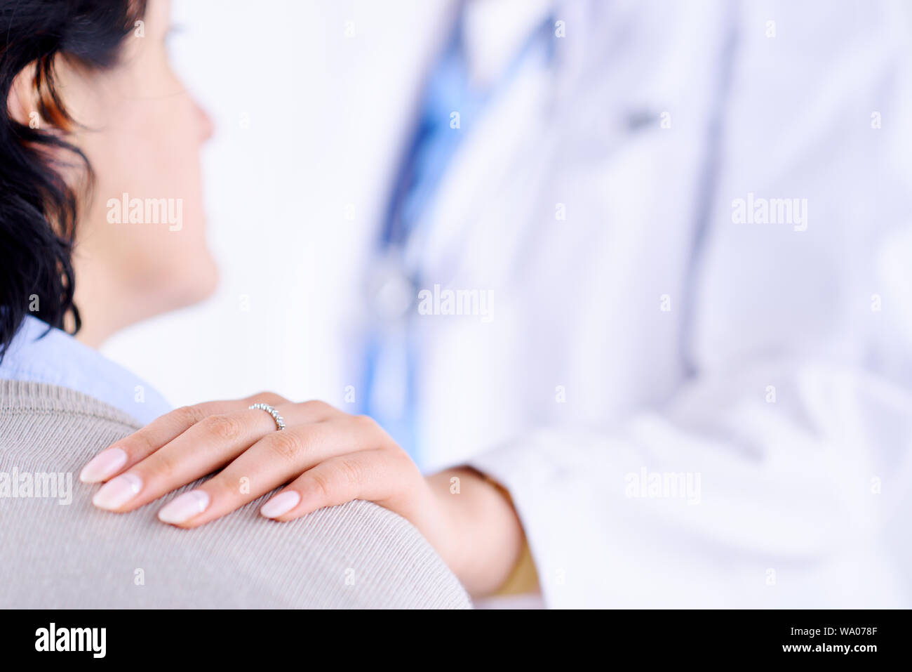 The doctor reassures the patient. Doctor and patient conversation Stock ...