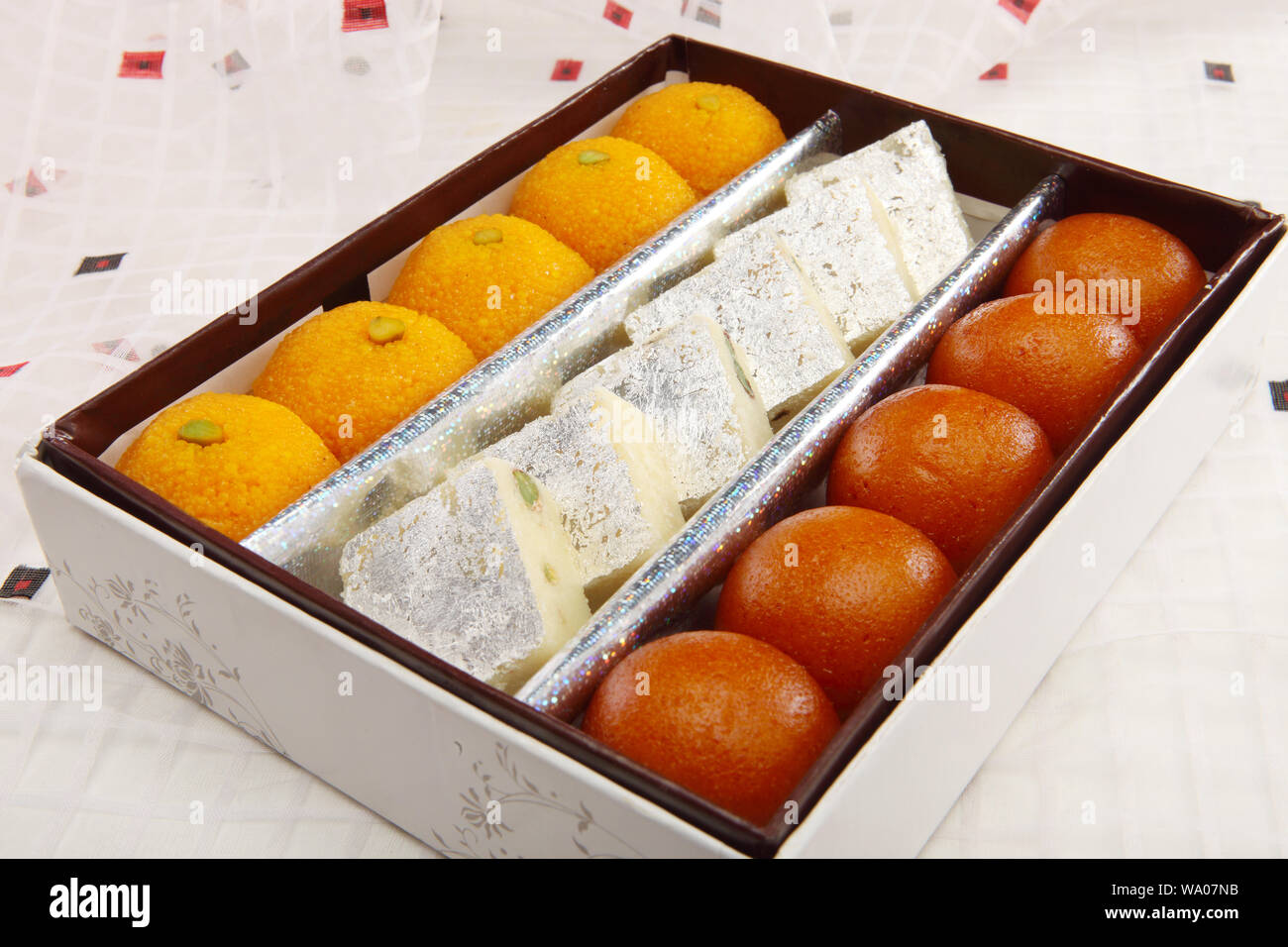 Box of Indian sweets Stock Photo - Alamy