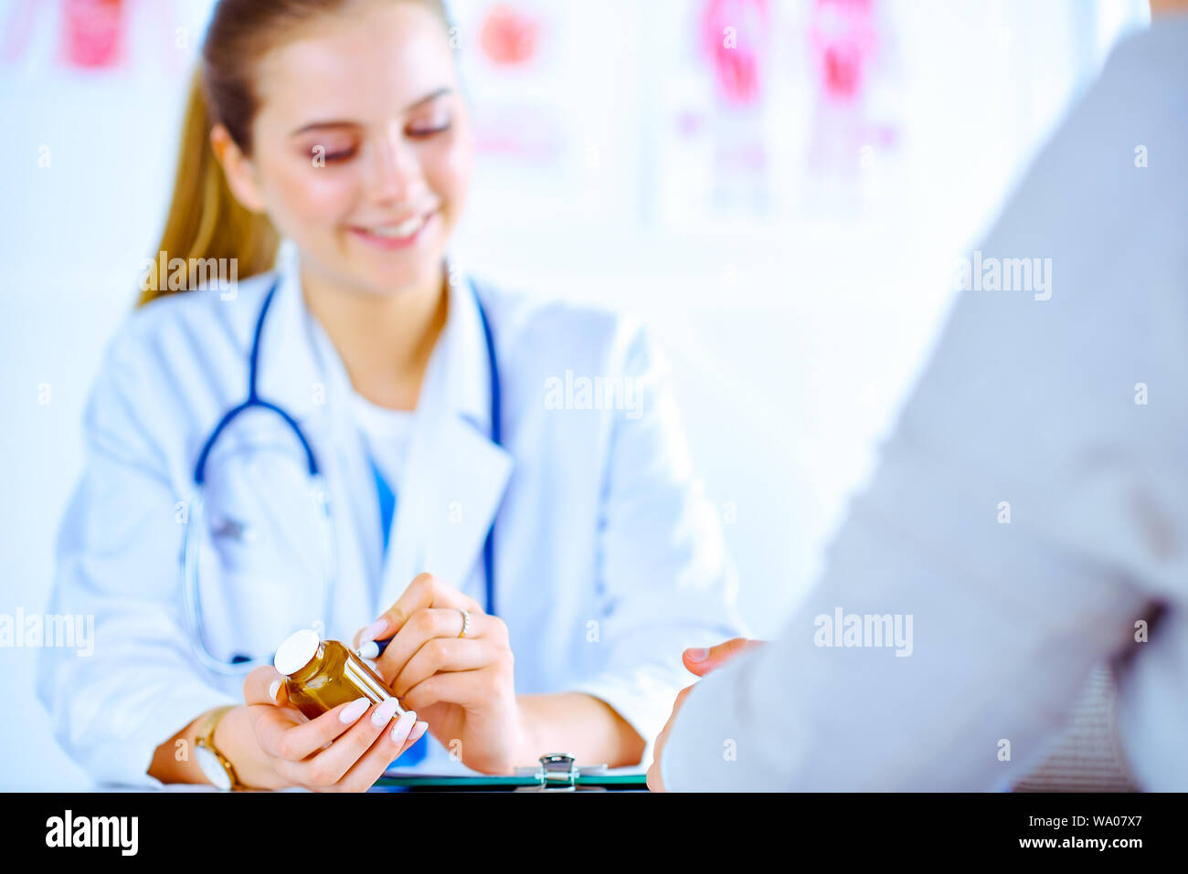 Female doctor prescribing medication patient hi-res stock photography ...