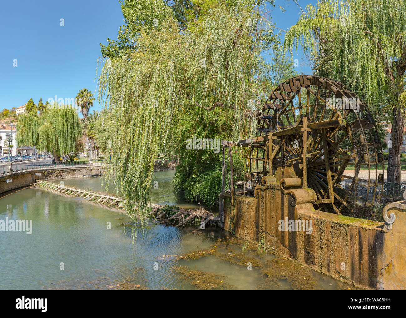 Large waterwheel at the Mouchão Parque, Nabao river, Tomar, Portugal ...