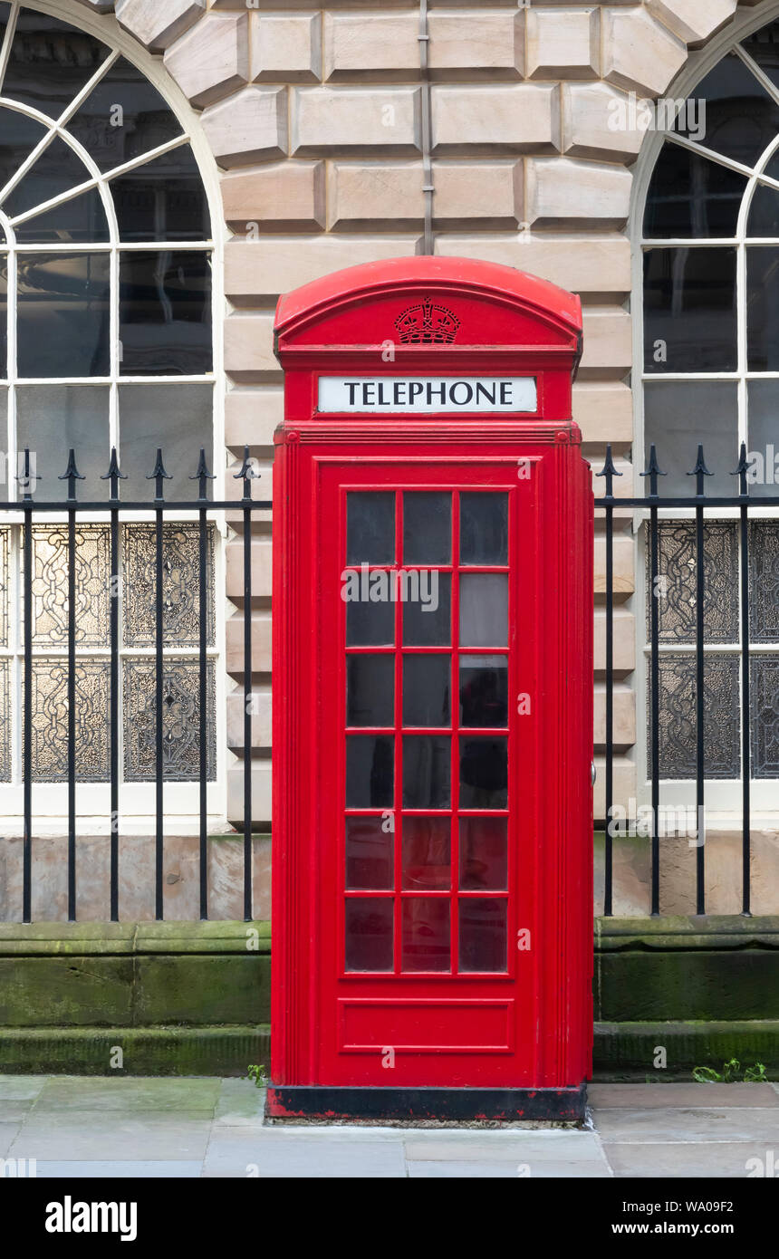 Traditional red British telephone booth Stock Photo - Alamy