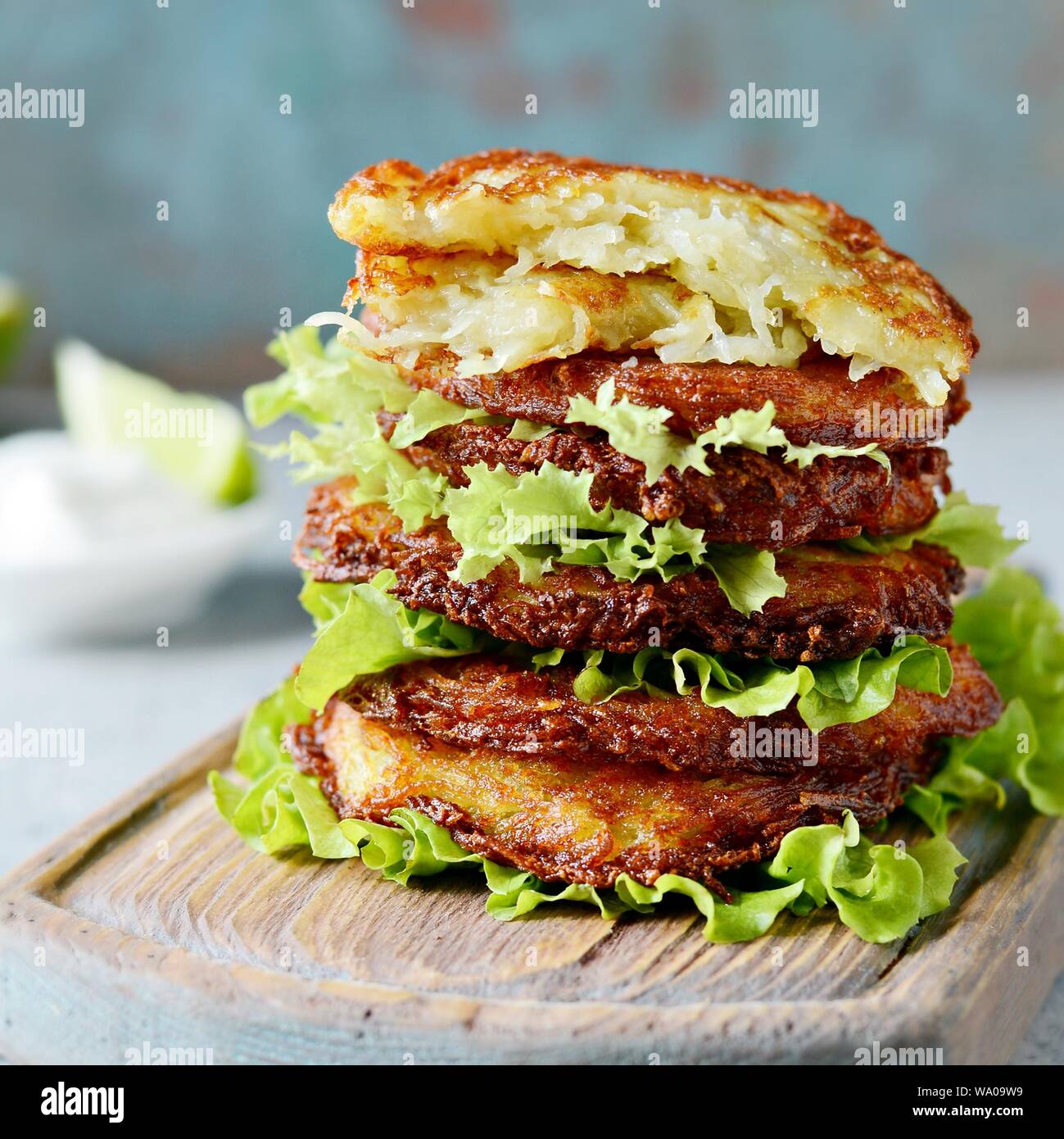 Stack golden potato fritters hi-res stock photography and images - Alamy