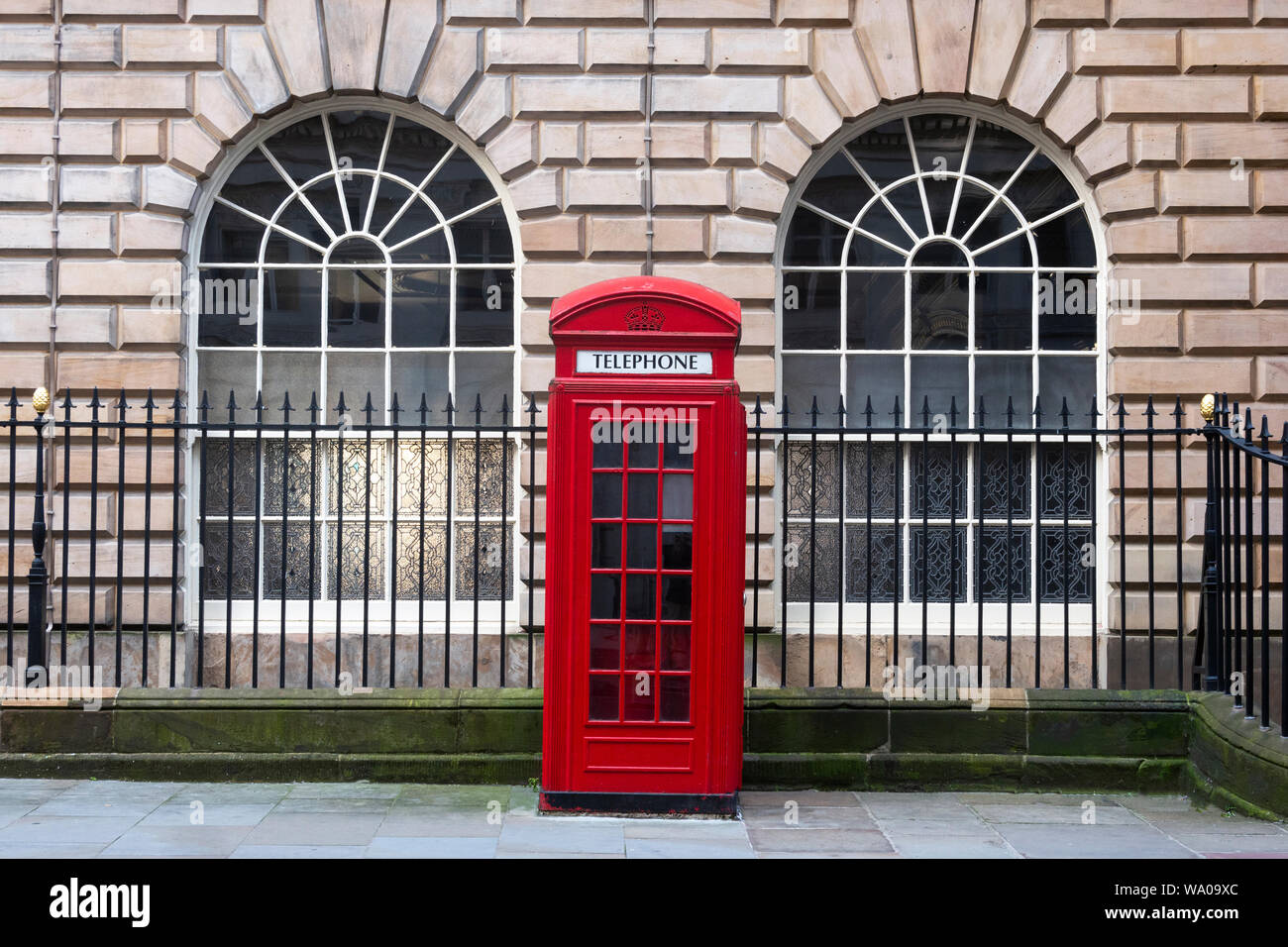 Traditional red British telephone booth Stock Photo - Alamy