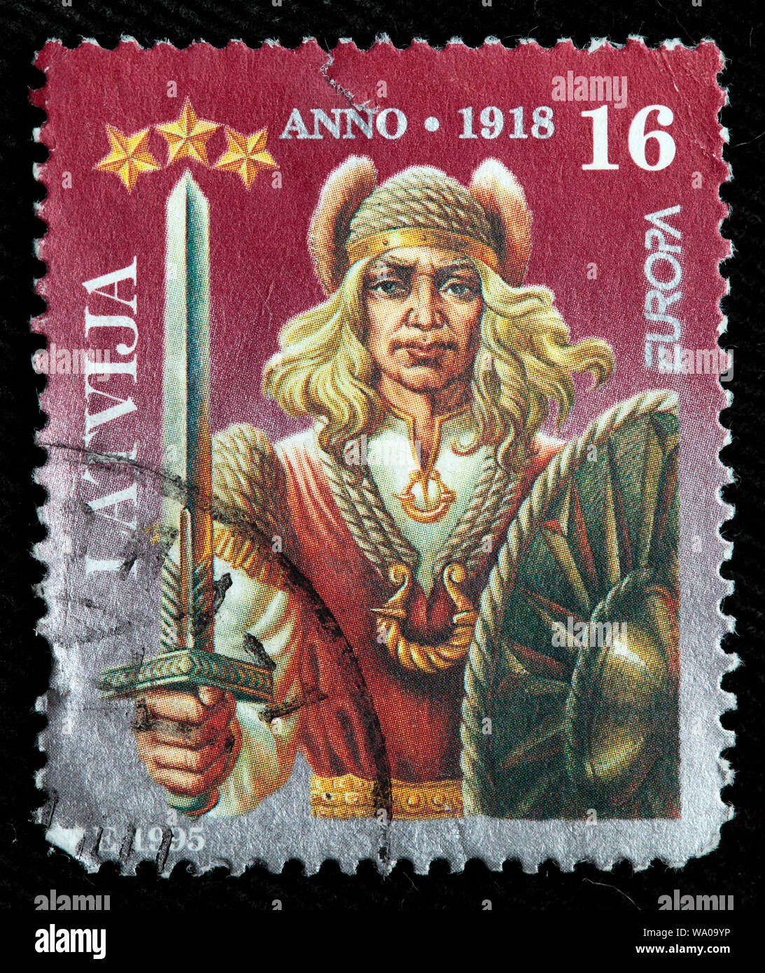 Warrior with sword and shield, postage stamp, Latvia, 1995 Stock Photo ...