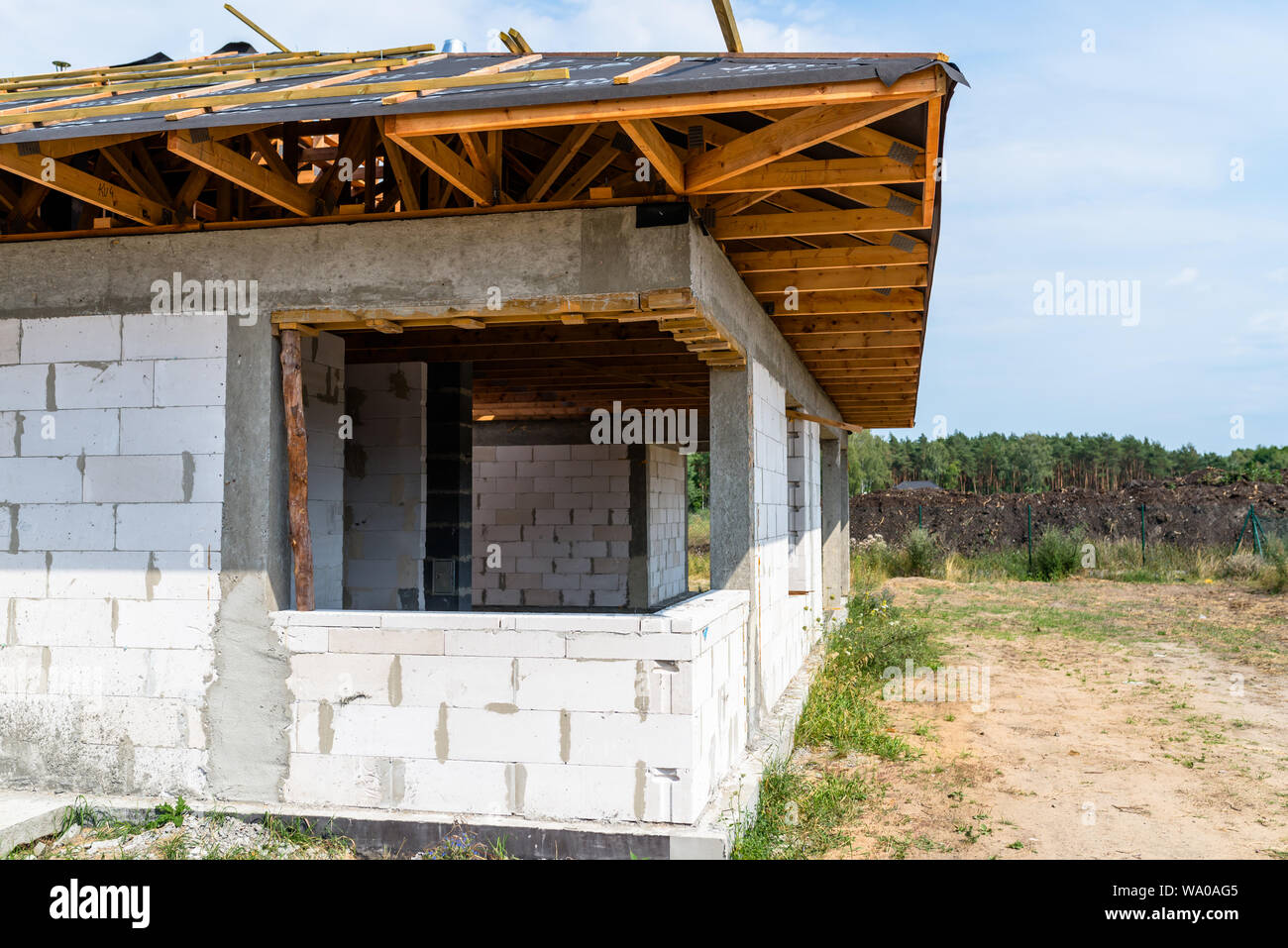Roof trusses covered with a membrane on a detached house under ...
