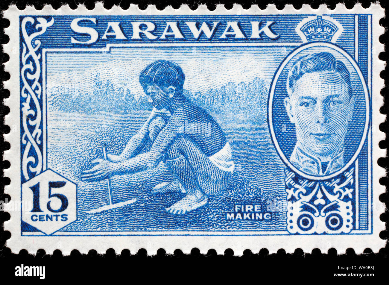 Fire Making, postage stamp, Sarawak, 1950 Stock Photo - Alamy