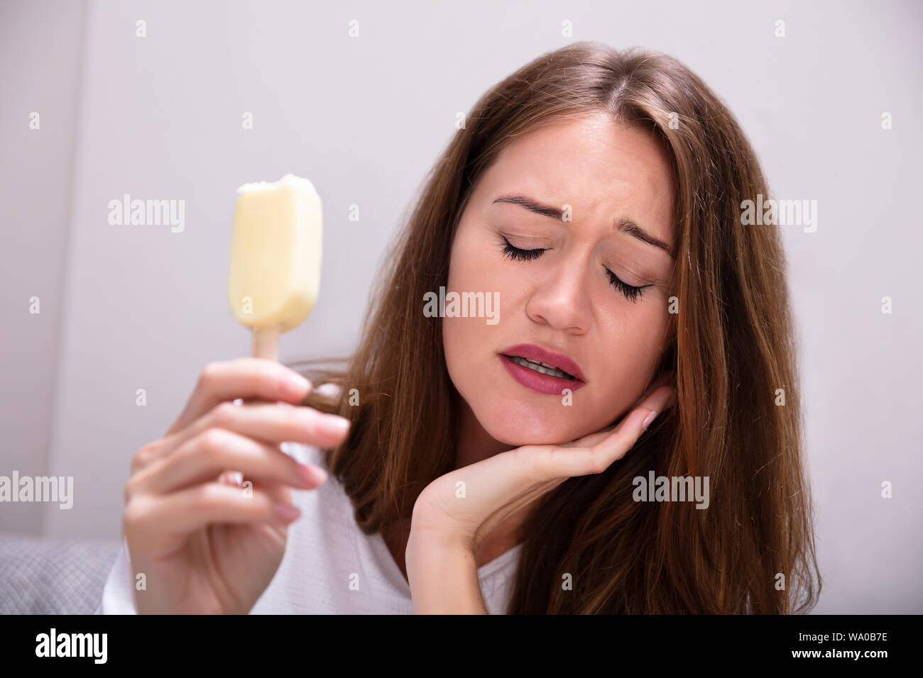 Painful teeth ice cream hi-res stock photography and images - Alamy