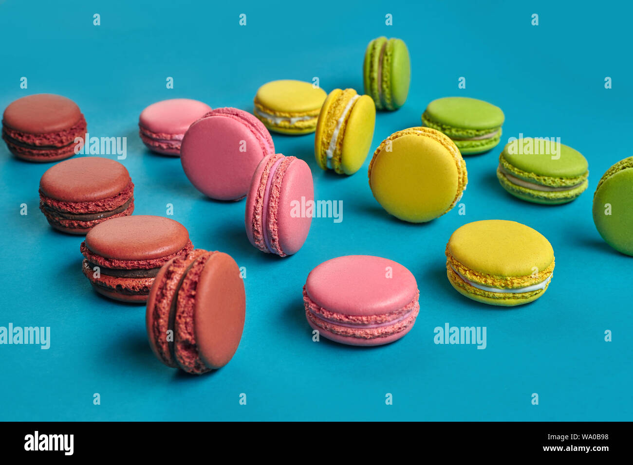 Side view of a multicolored macarons or macaroons, sweet meringue-based ...