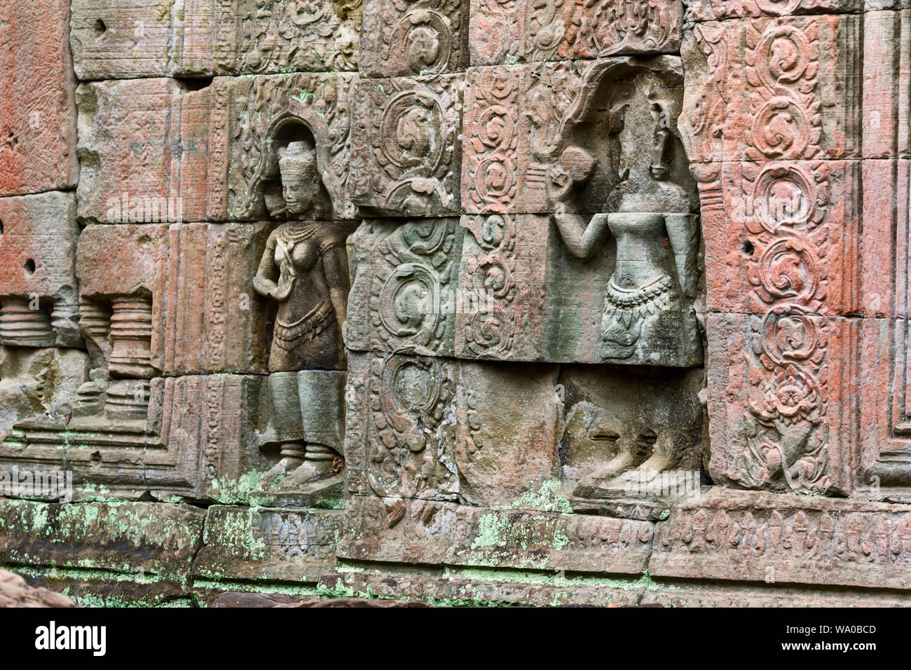 a statue of devata whose face was sliced in Preah Khan temple, Khmer ...