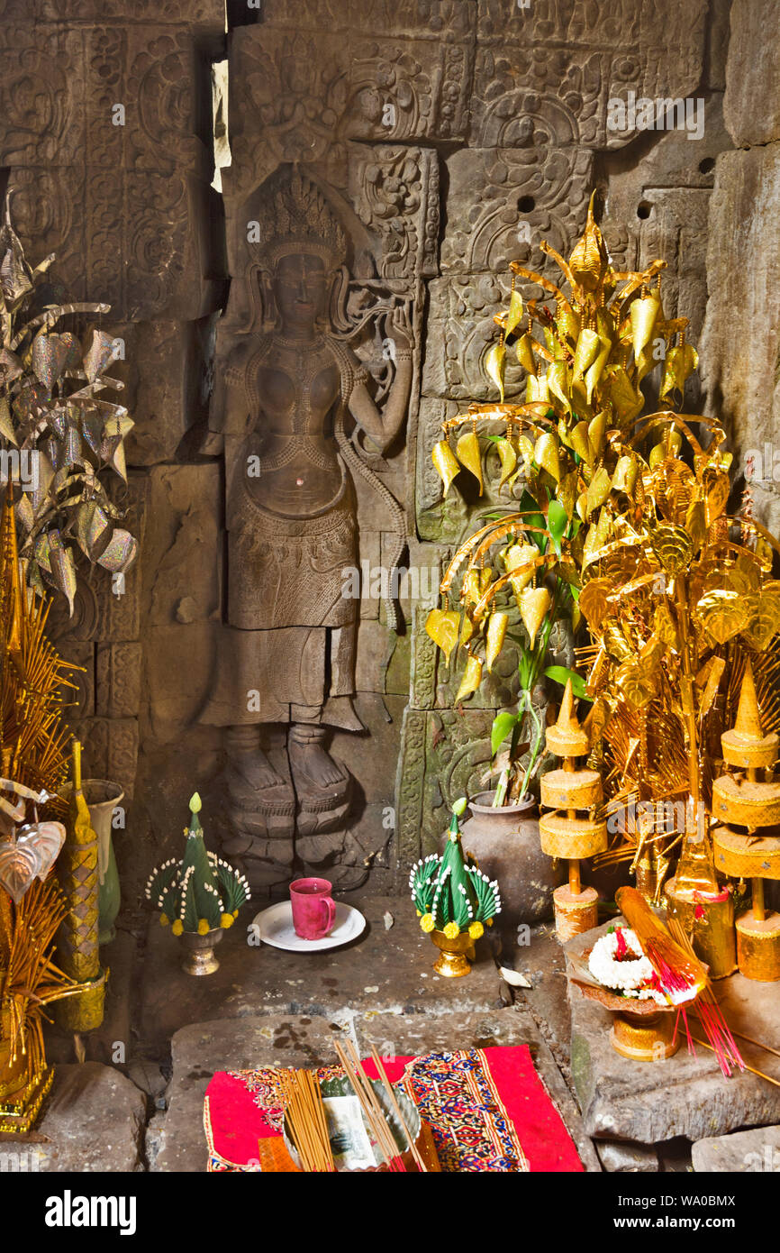the Queen Indradevi statue inside Preah Khan temple, Khmer ruins in ...