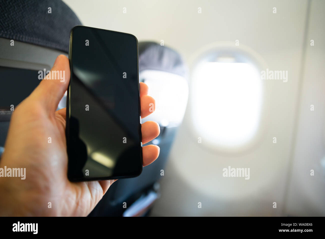 Hand holding plane hi-res stock photography and images - Alamy