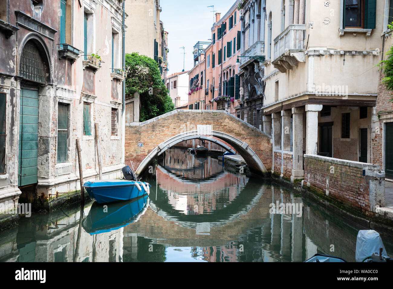 Small Bridge Connecting The Old Houses Along The Canal Stock Photo - Alamy