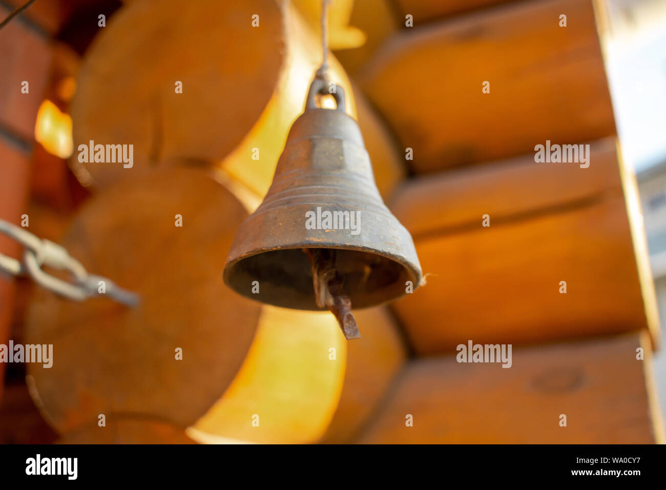 Bell on traditional russian village house made of logs. Authentic ...