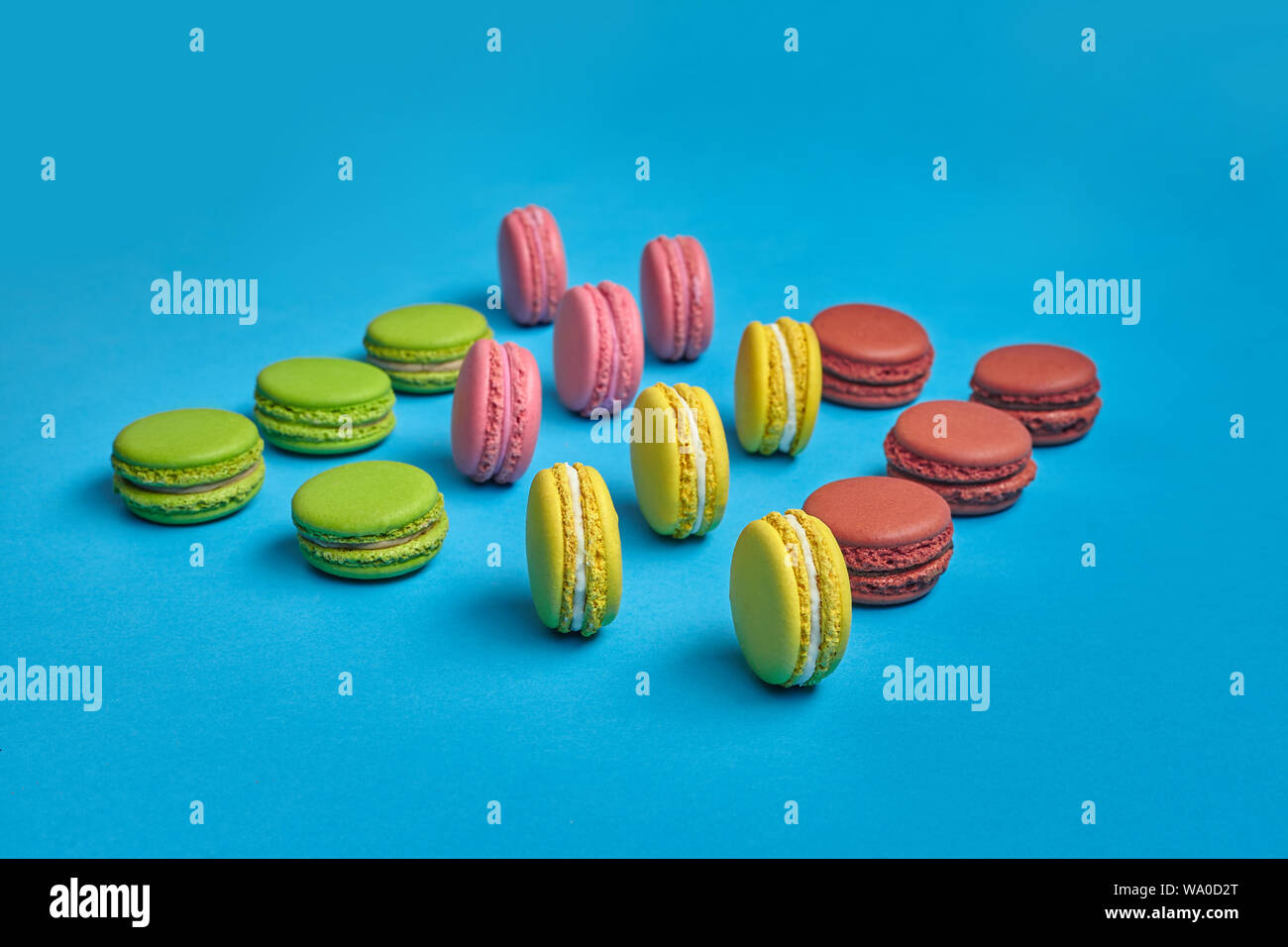 Side view of a colored macarons or macaroons, sweet meringue-based ...