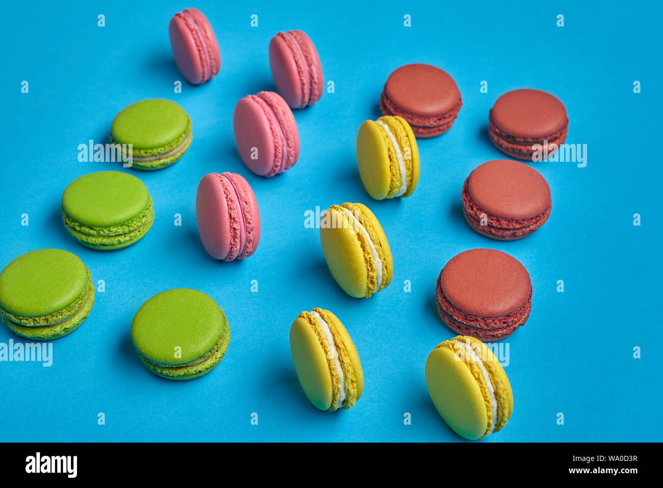 Side view of a colored macarons or macaroons, sweet meringue-based ...