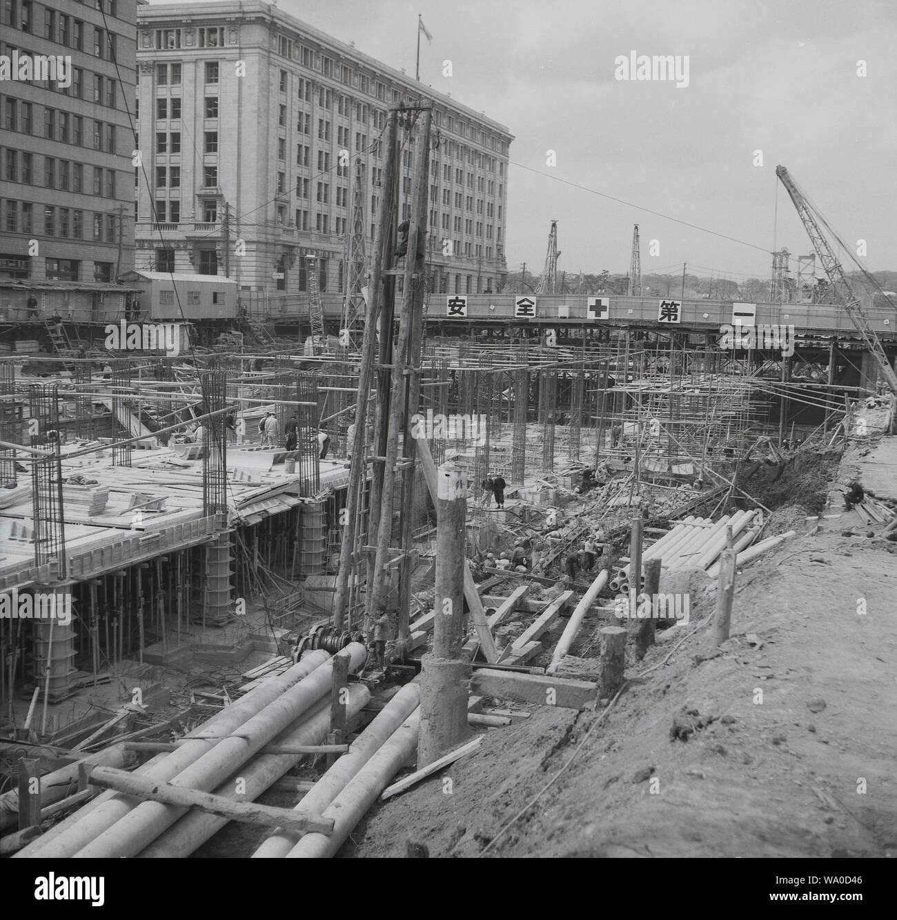 1960s, historical, large post-war office block construction site in the ...