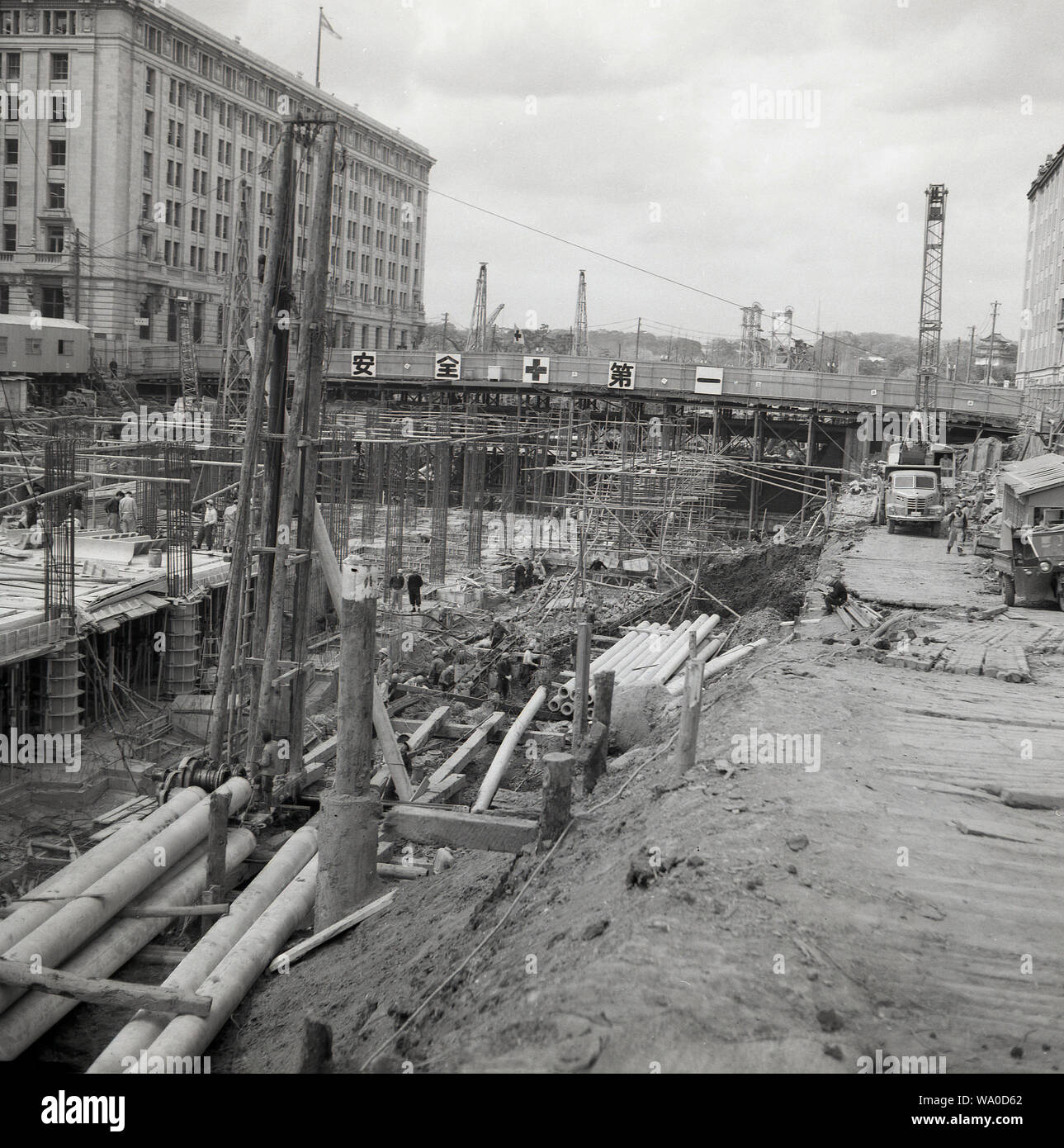 1960s, historical, large post-war office block construction site in the ...