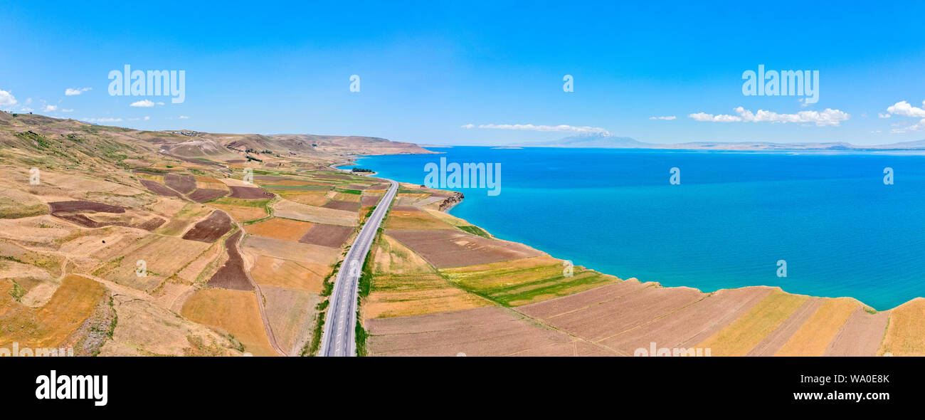 Aerial view of Lake Van the largest lake in Turkey, fields and cliffs ...
