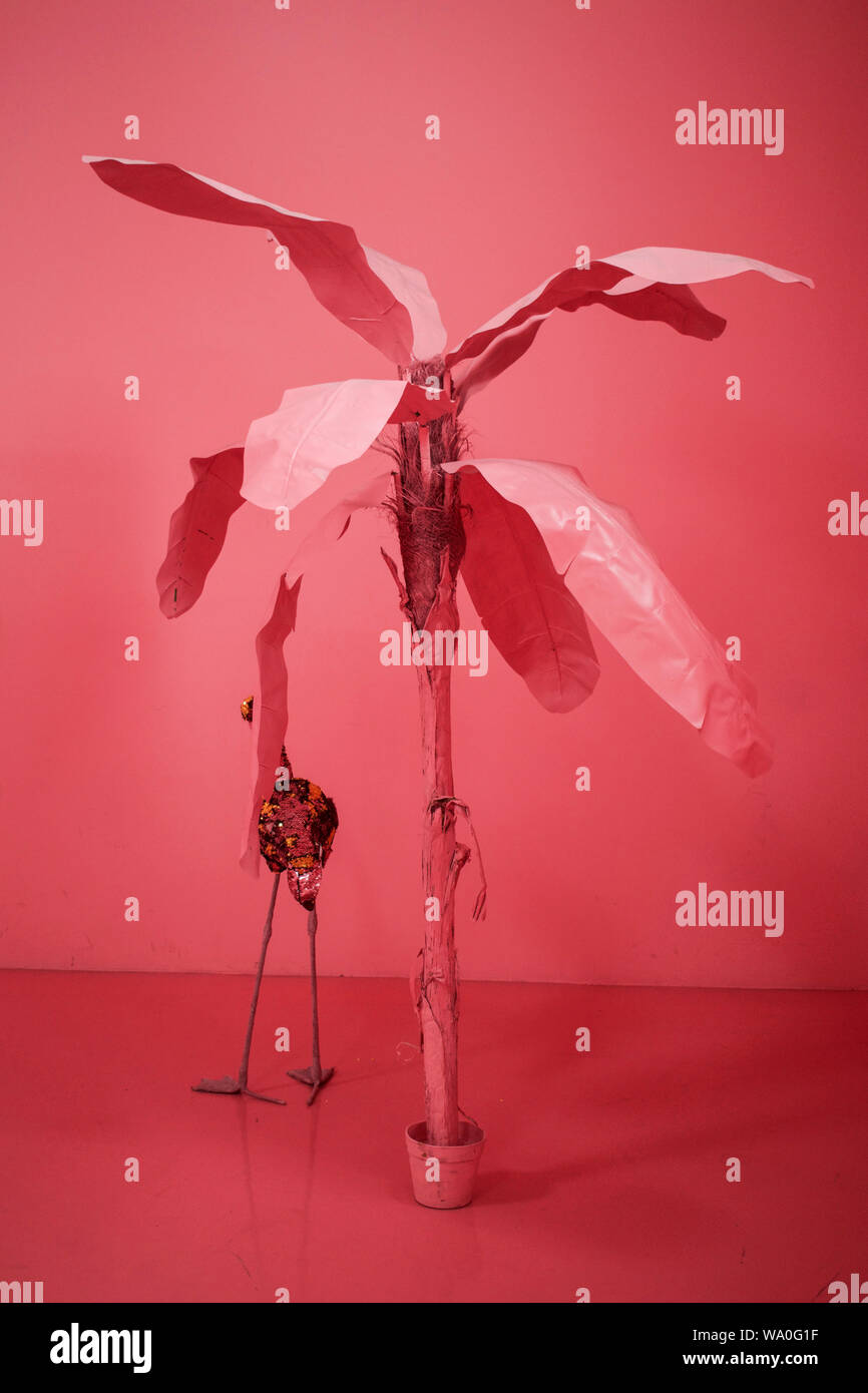 Pink palm tree and flamingo Stock Photo - Alamy