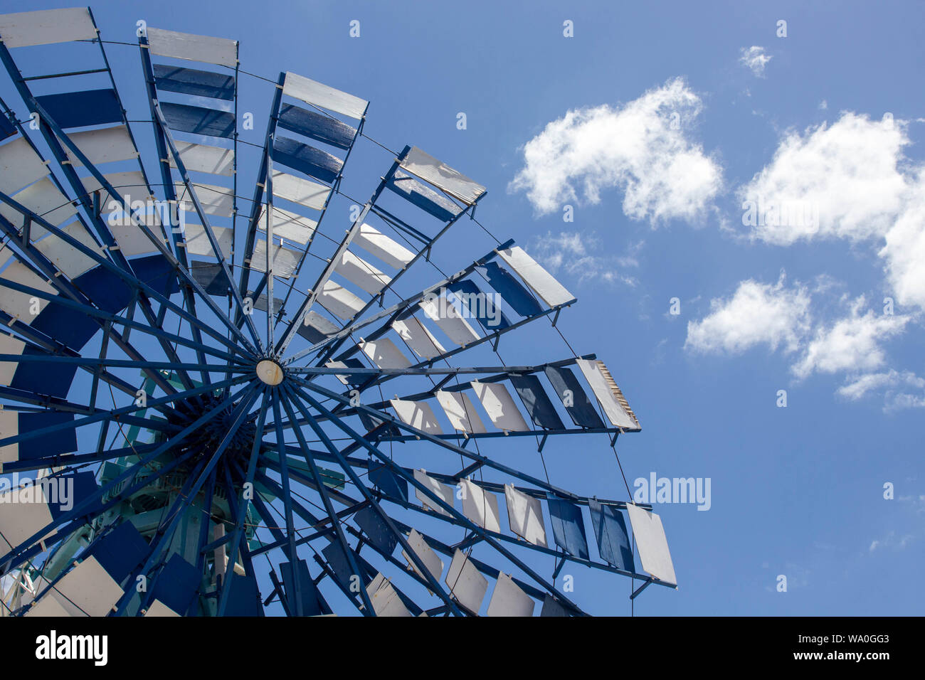 The big blue and white pinwheel rises to the sky Stock Photo - Alamy