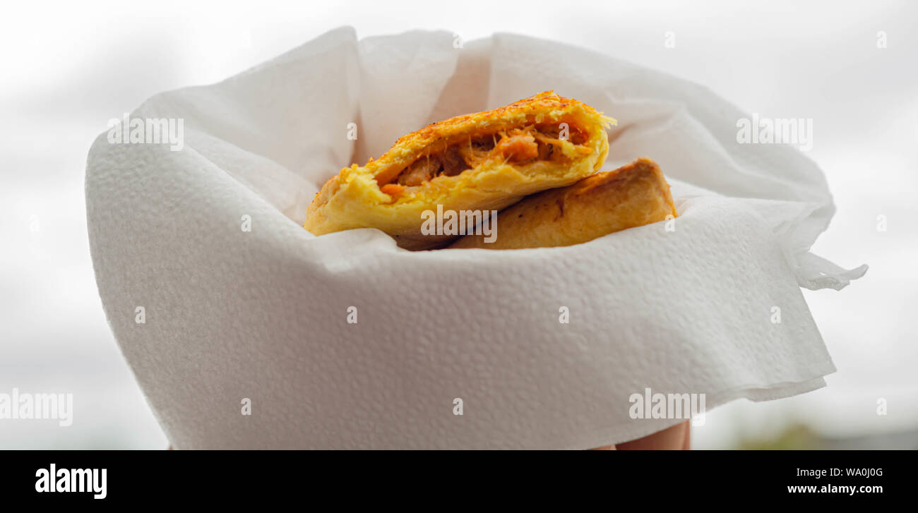 Delicious pulled pork and bourbon filling baked in saffron pastry in ...