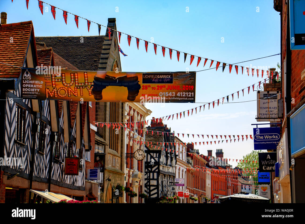 Bunting hung between shops in Bore Street, Lichfield, England, UK Stock ...