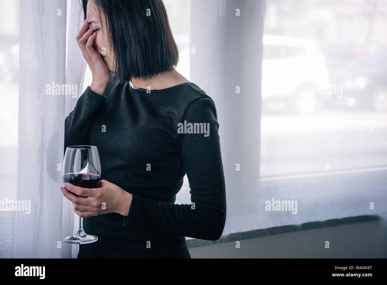 depressed woman with wine glass crying at home Stock Photo - Alamy