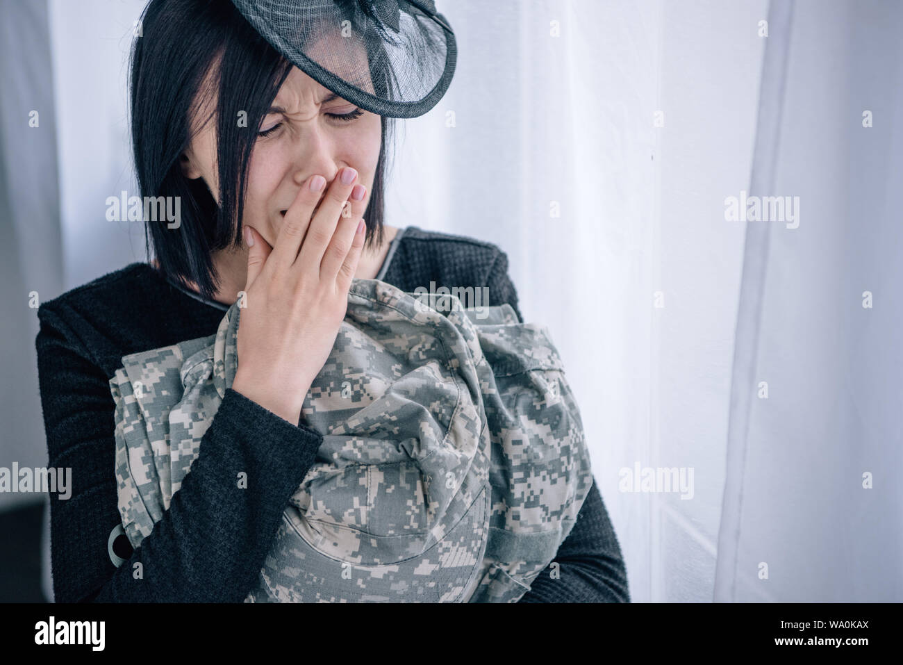 Crying cry emotional army hi-res stock photography and images - Alamy