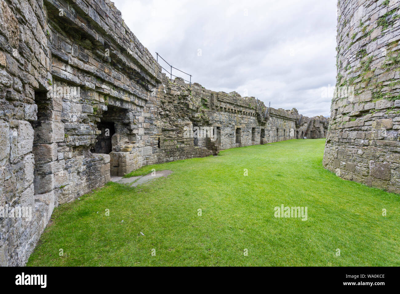 The impressive remains of the Outer Ward at the historic Beaumaris ...