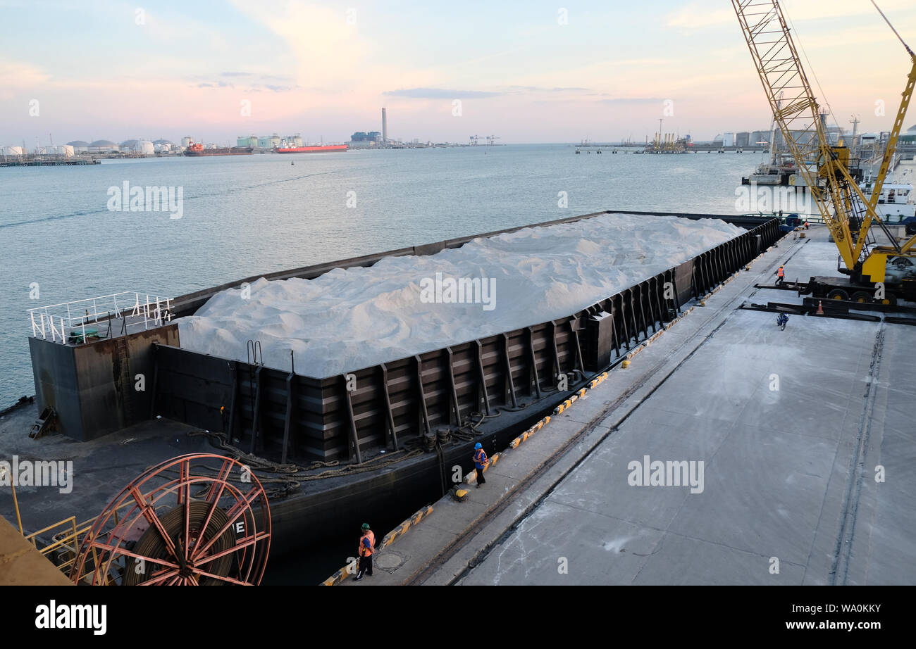 Barges waiting for discharge Dust granite at the jetty Stock Photo - Alamy