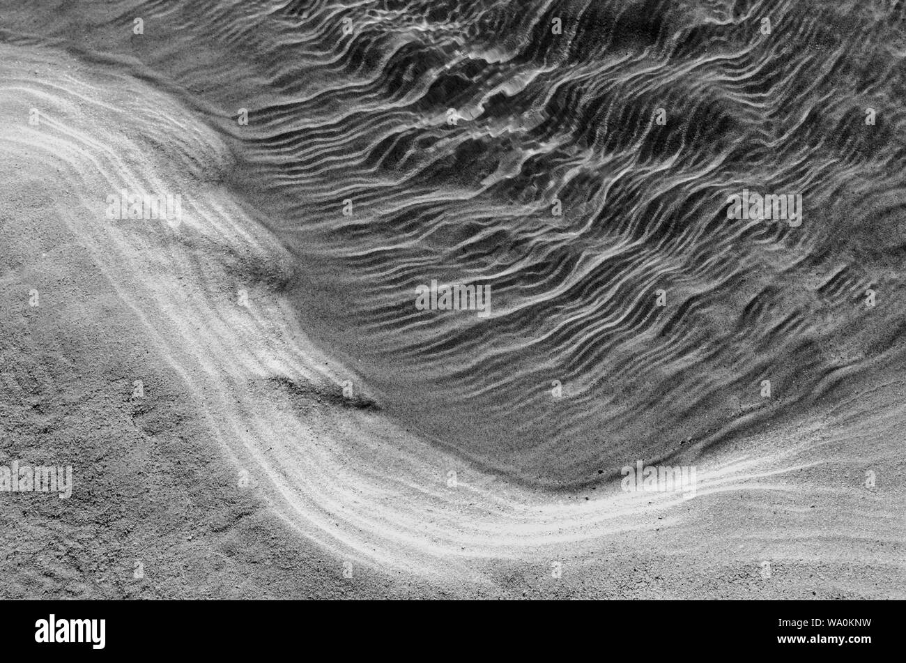 Still life capturing the patterns and ripples in a tidal pool at ...