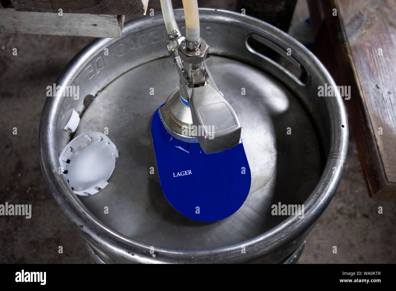Beer keg or tank with blue label close up image. Mock up with copy ...