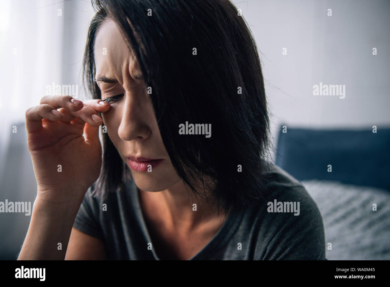 Wiping tears hi-res stock photography and images - Alamy