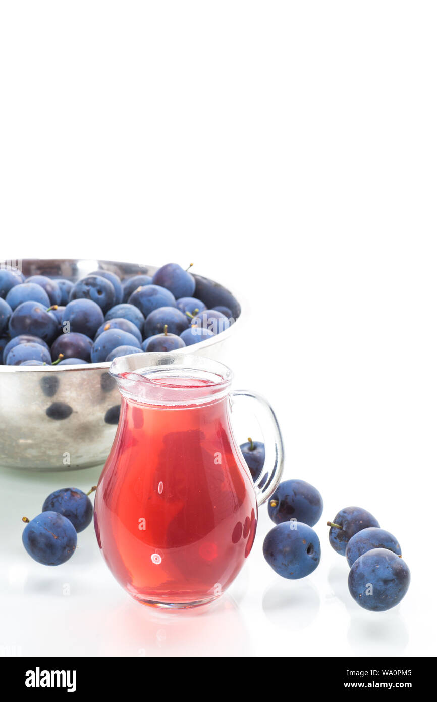 sweet compote of autumn blue plums isolated on white background Stock ...