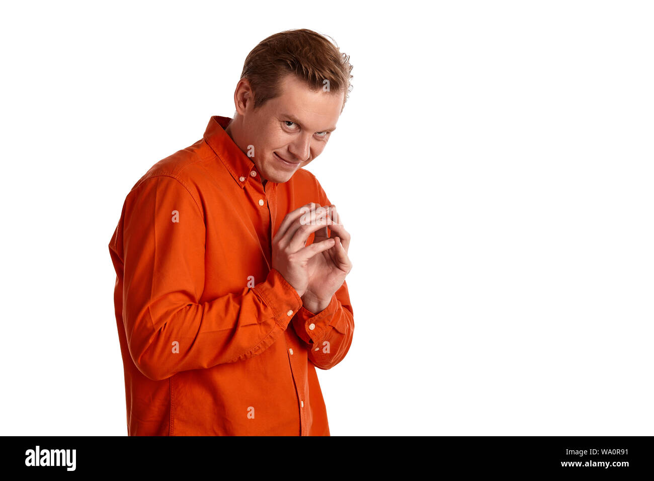 Close-up portrait of a young fashionable ginger male in a stylish ...