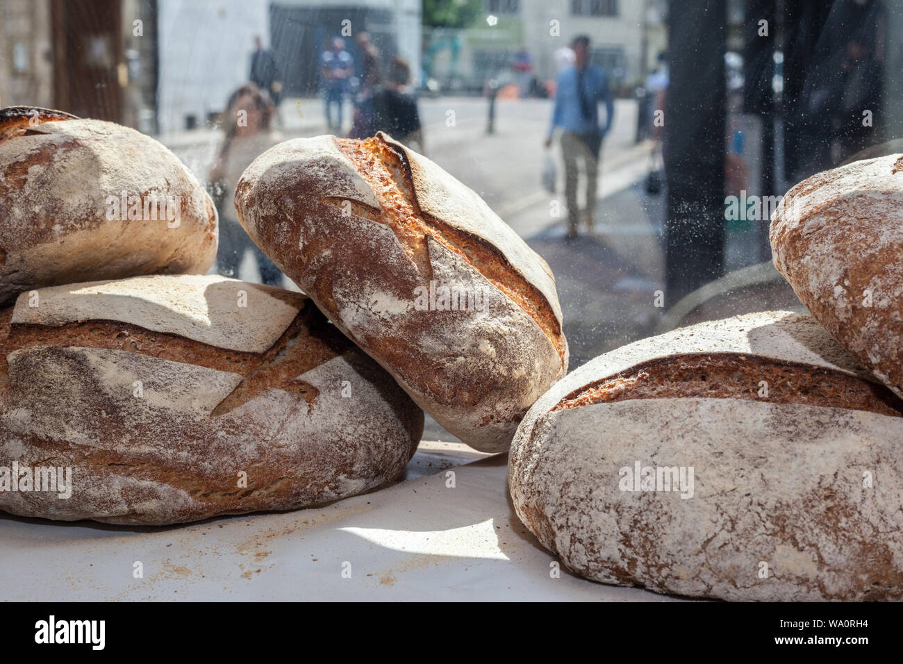A bakers window full of freshly baked loaves Stock Photo - Alamy