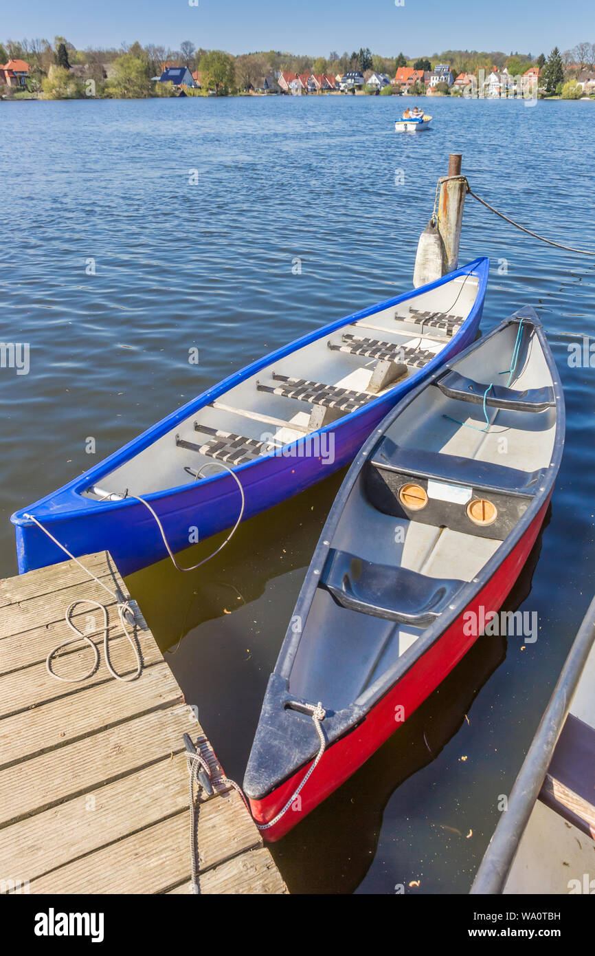 Canoes at the Stadtsee lake in Molln, Germany Stock Photo - Alamy