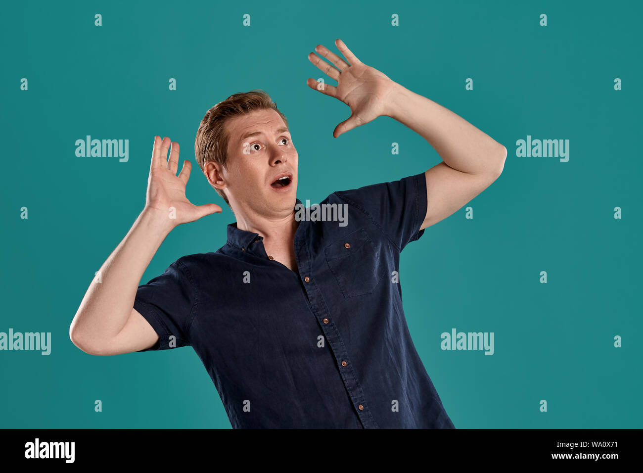 Close-up portrait of a young lovely ginger peson in a stylish navy t ...