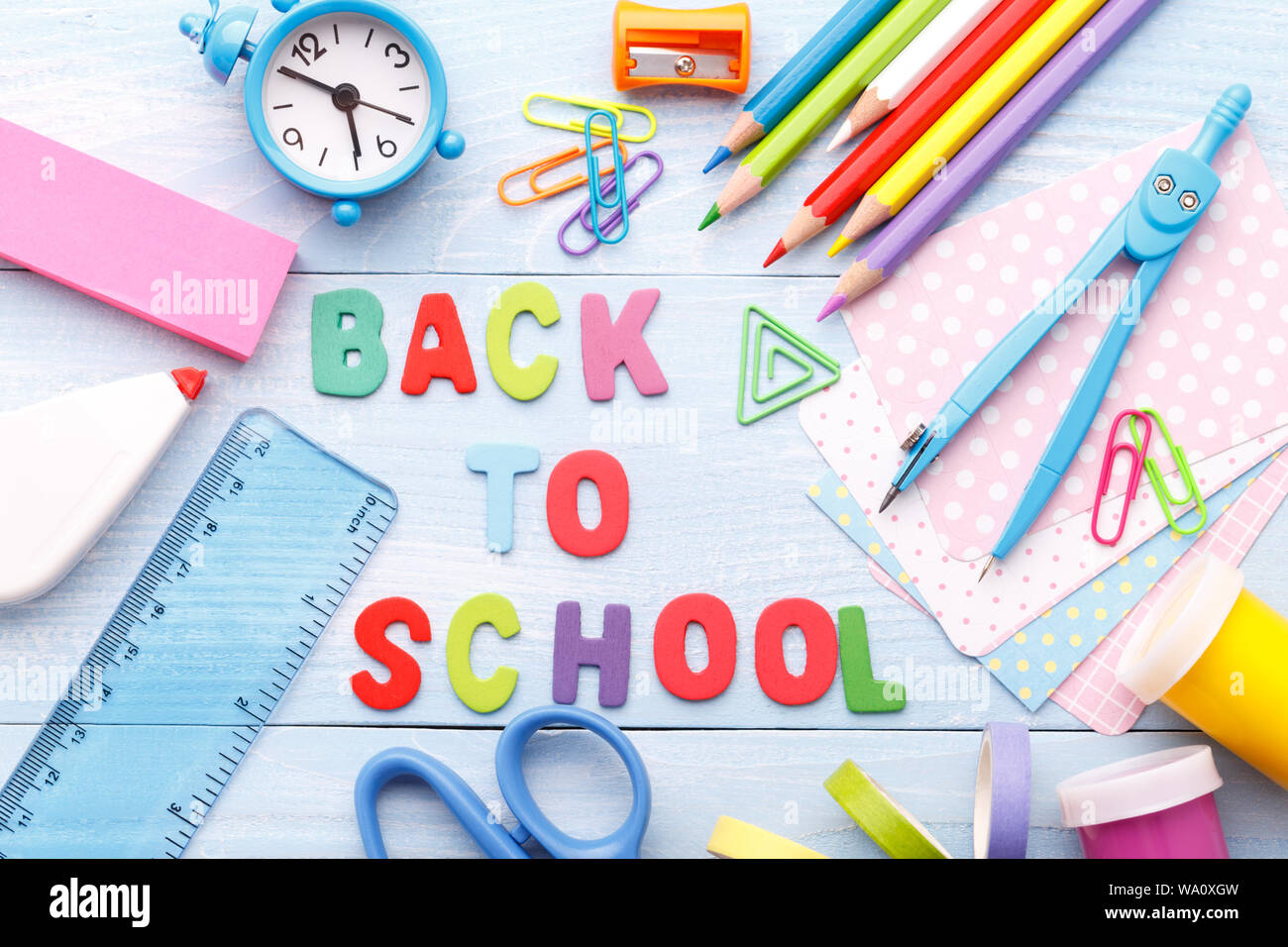 Back to school concept, with colorful wooden letters and stationery for ...