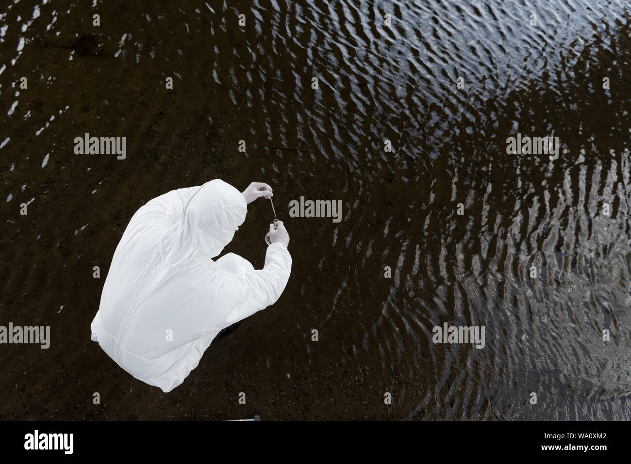 Taking sample from pond hi-res stock photography and images - Alamy