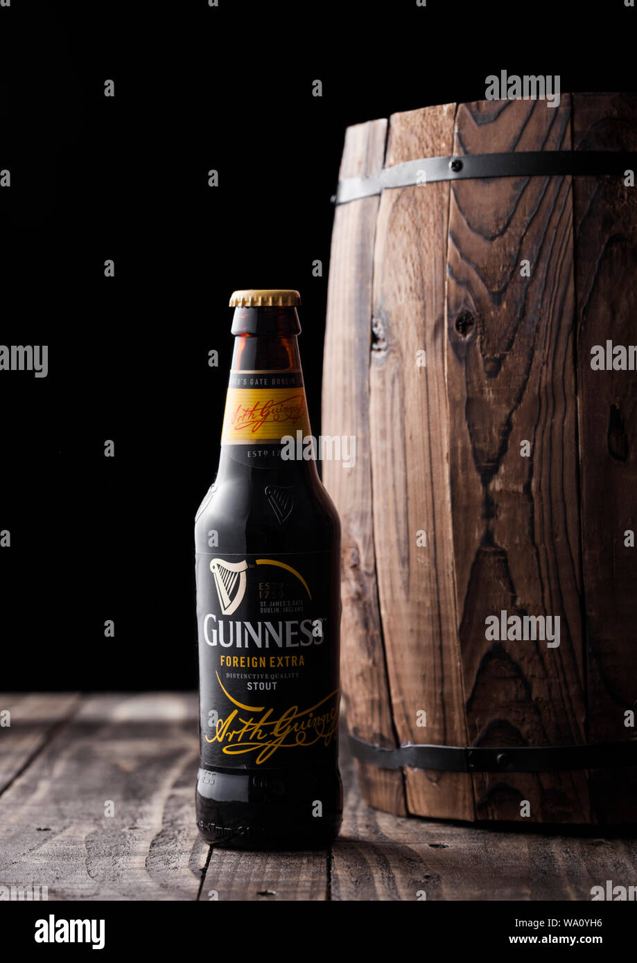 LONDON, UK - APRIL 27, 2018: Bottle of Guinness draught stout beer next ...