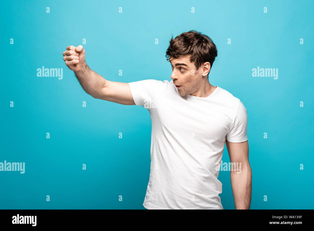 Angry young man looking hi-res stock photography and images - Alamy