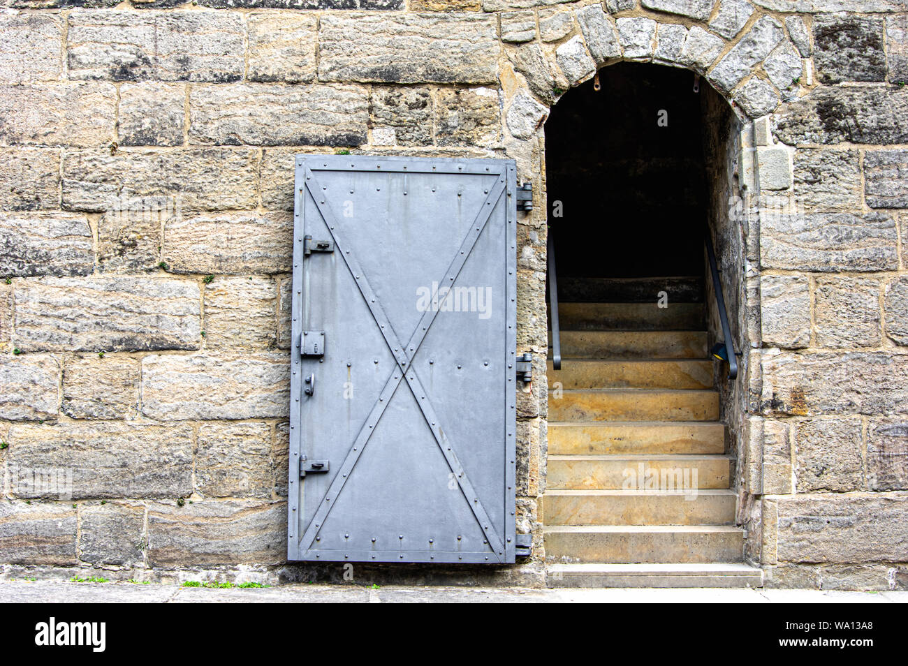 old steel door in a wall in medieval fortress königstein Stock Photo ...