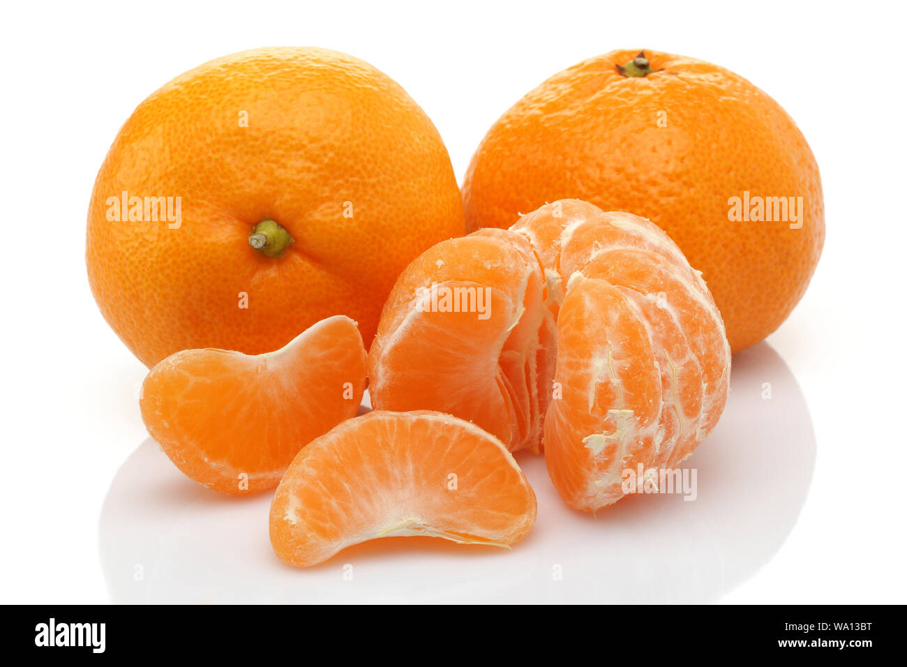 Whole and slice fresh tangerines isolated on white background Stock ...