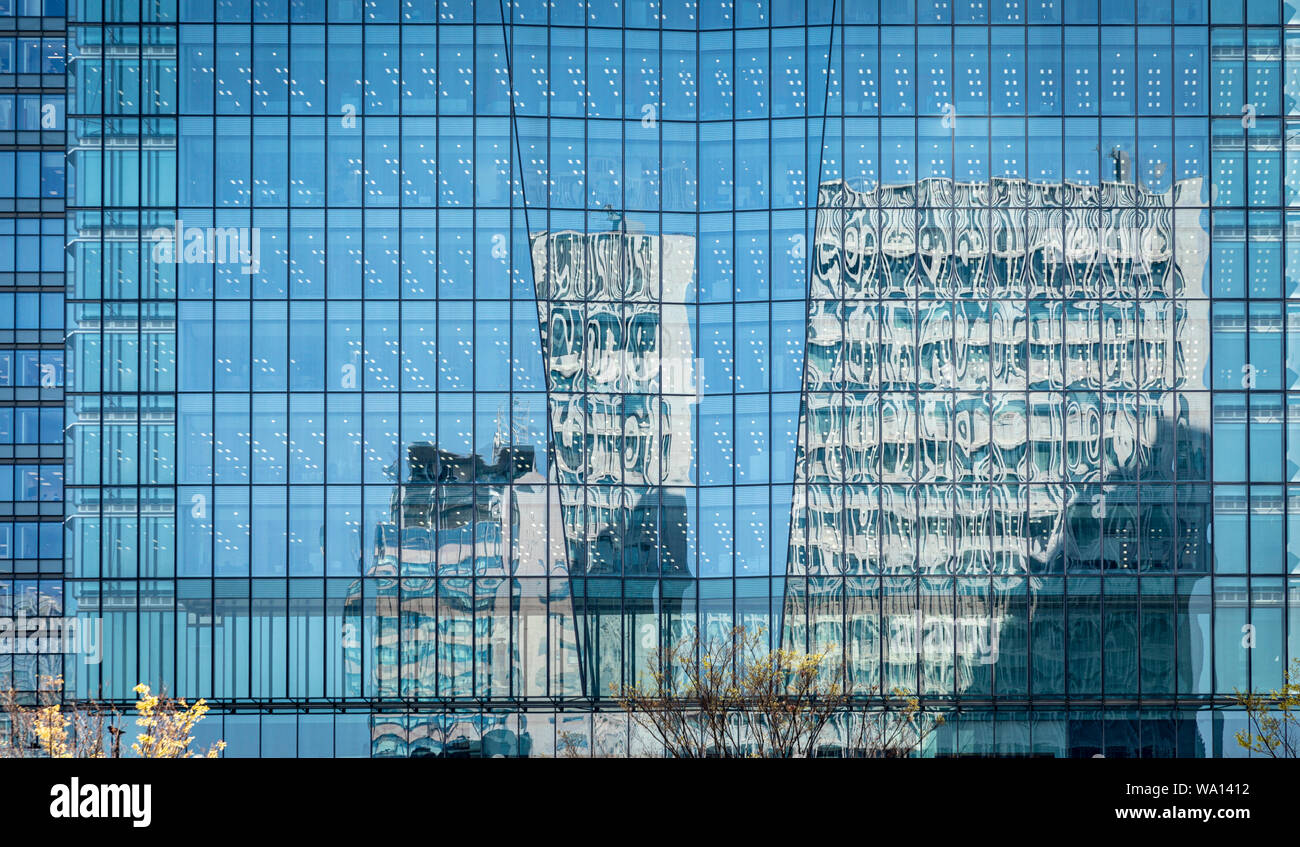 Reflections of Tokyo skyline in glass windows, Tokyo, Japan Stock Photo ...