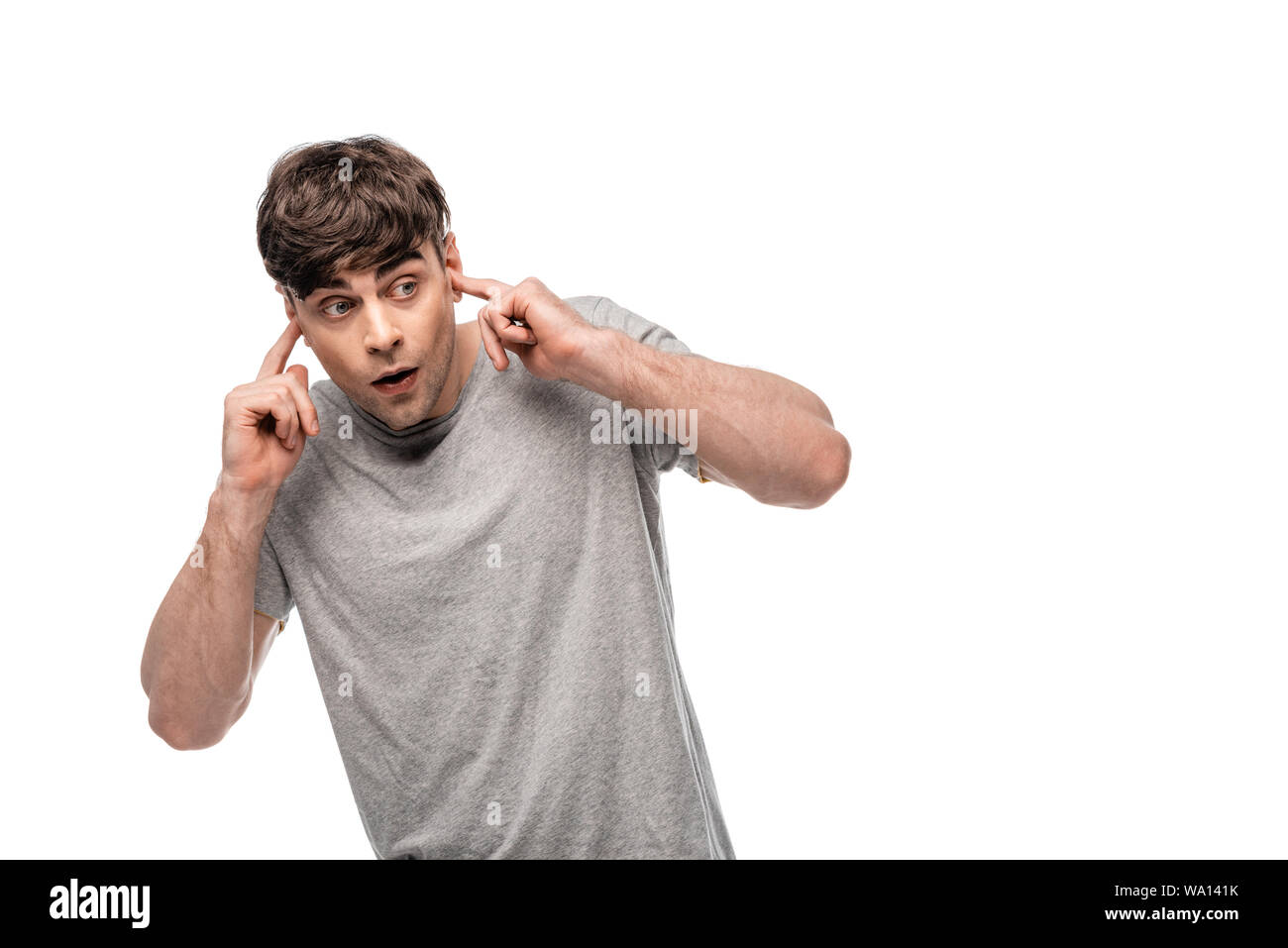 Plugging their ears hi-res stock photography and images - Alamy