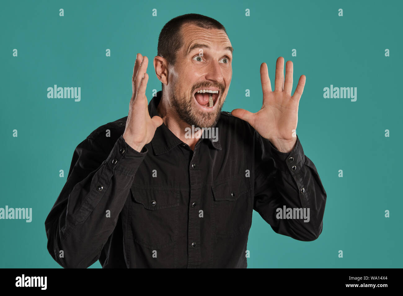 Close-up studio shot of a good-looking person with beard and mustache ...