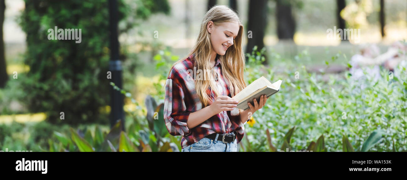 Beautiful girl reading in nature hi-res stock photography and images ...